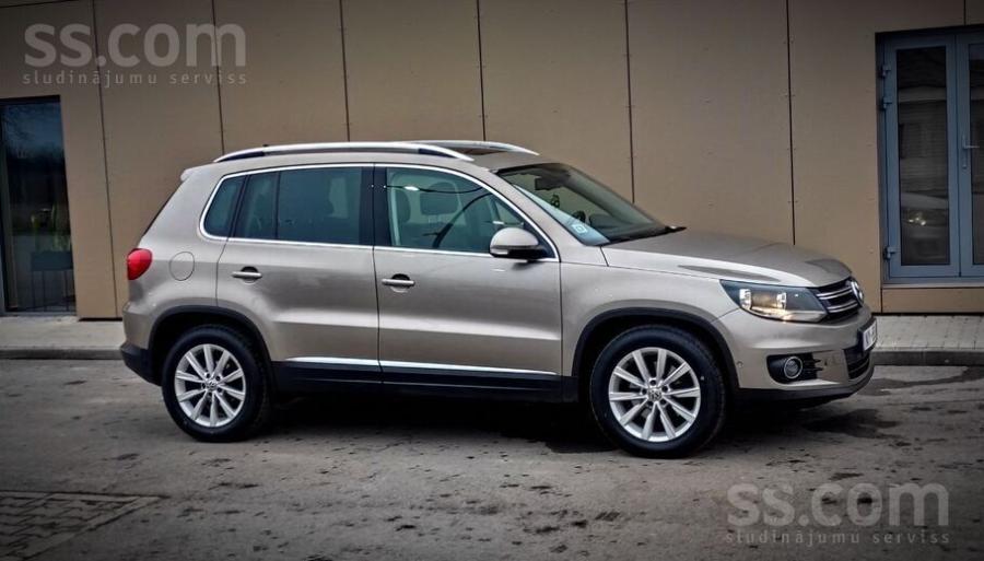 Brown Volkswagen Tiguan 2014 in Tukums, with an engine capacity of 2.00 L and mileage of 301 thousand km for 8500 €, photo 7 on AUTOMOTO.COM.LV