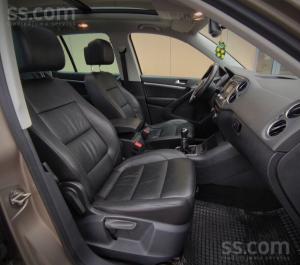 Brown Volkswagen Tiguan 2014 in Tukums, with an engine capacity of 2.00 L and mileage of 301 thousand km for 8500 €, photo 9 on AUTOMOTO.COM.LV