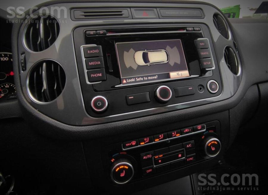 Brown Volkswagen Tiguan 2014 in Tukums, with an engine capacity of 2.00 L and mileage of 301 thousand km for 8500 €, photo 16 on AUTOMOTO.COM.LV