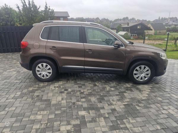 Brūns Volkswagen Tiguan 2014 Telšiai, ar dzinēja tilpumu 1.97 L un nobraukumu 245 tūkst. km par 5600 €, foto 1 vietnē AUTOMOTO.COM.LV