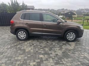 Brown Volkswagen Tiguan 2014 in Telschi, with an engine capacity of 1.97 L and mileage of 245 thousand km for 5600 €, photo  on AUTOMOTO.COM.LV