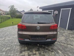 Brown Volkswagen Tiguan 2014 in Telschi, with an engine capacity of 1.97 L and mileage of 245 thousand km for 5600 €, photo 4 on AUTOMOTO.COM.LV