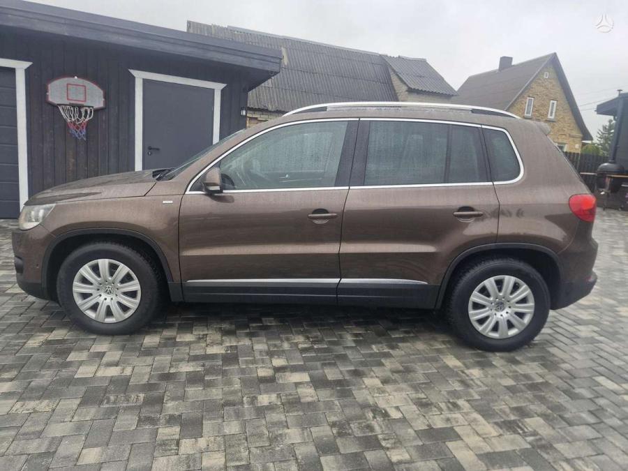 Brown Volkswagen Tiguan 2014 in Telschi, with an engine capacity of 1.97 L and mileage of 245 thousand km for 5600 €, photo 6 on AUTOMOTO.COM.LV