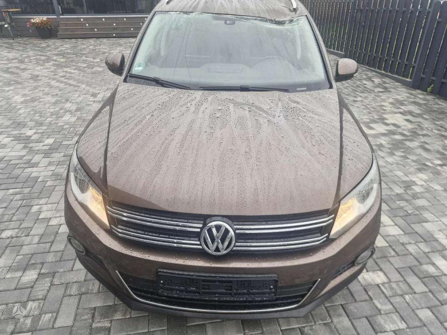 Brown Volkswagen Tiguan 2014 in Telschi, with an engine capacity of 1.97 L and mileage of 245 thousand km for 5600 €, photo 8 on AUTOMOTO.COM.LV