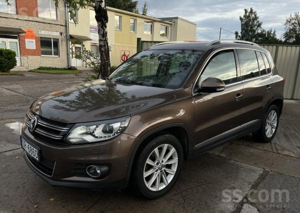 Brūns Volkswagen Tiguan 2014 Rīga, ar dzinēja tilpumu 2.00 L un nobraukumu 187 tūkst. km par 8750 €, foto 1 vietnē AUTOMOTO.COM.LV