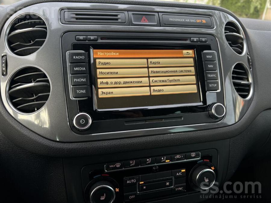 Brown Volkswagen Tiguan 2014 in Riga, with an engine capacity of 2.00 L and mileage of 187 thousand km for 8250 €, photo 23 on AUTOMOTO.COM.LV