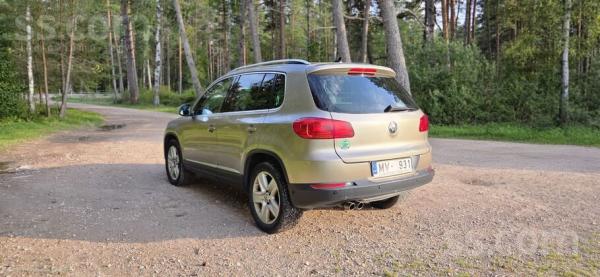 Brown Volkswagen Tiguan 2014 in Jurmala, with an engine capacity of 2.00 L and mileage of 285 thousand km for 8500 €, photo 5 on AUTOMOTO.COM.LV