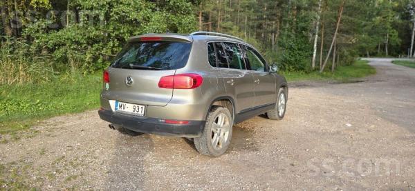 Brown Volkswagen Tiguan 2014 in Jurmala, with an engine capacity of 2.00 L and mileage of 285 thousand km for 8500 €, photo 8 on AUTOMOTO.COM.LV