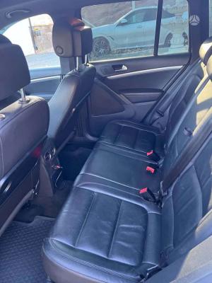 Brown Volkswagen Tiguan 2015 in Mazeikiai, with an engine capacity of 1.97 L and mileage of 156 thousand km for 11000 €, photo 7 on AUTOMOTO.COM.LV