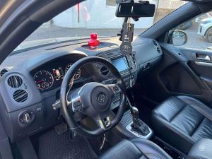 Brown Volkswagen Tiguan 2015 in Mazeikiai, with an engine capacity of 1.97 L and mileage of 156 thousand km for 11000 €, photo 10 on AUTOMOTO.COM.LV