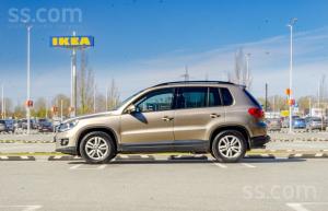 Brown Volkswagen Tiguan 2015 in Riga, with an engine capacity of 2.00 L and mileage of 186 thousand km for 7190 €, photo 5 on AUTOMOTO.COM.LV