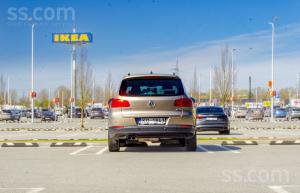 Brown Volkswagen Tiguan 2015 in Riga, with an engine capacity of 2.00 L and mileage of 186 thousand km for 7190 €, photo 7 on AUTOMOTO.COM.LV