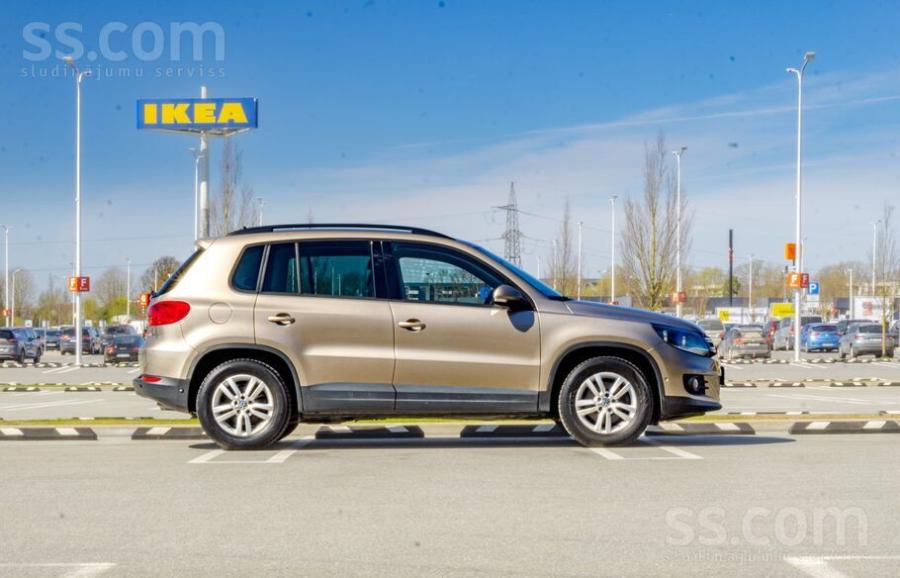 Brown Volkswagen Tiguan 2015 in Riga, with an engine capacity of 2.00 L and mileage of 186 thousand km for 7190 €, photo 9 on AUTOMOTO.COM.LV