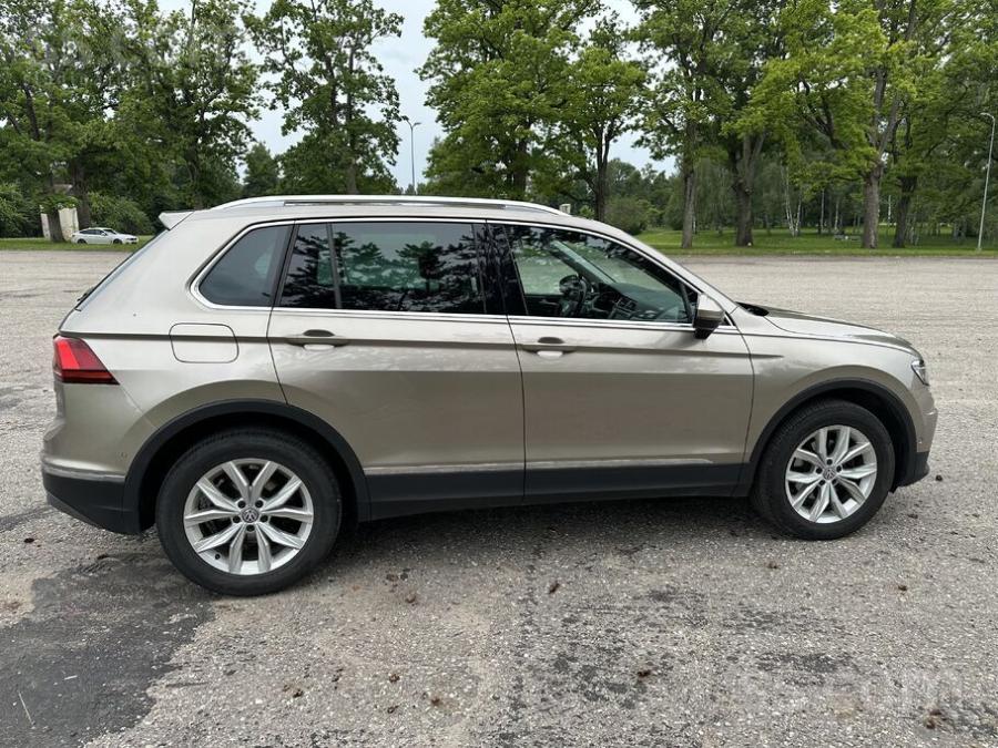 Brown Volkswagen Tiguan 2016 in Valmiera, with an engine capacity of 2.00 L and mileage of 184 thousand km for 14000 €, photo 9 on AUTOMOTO.COM.LV