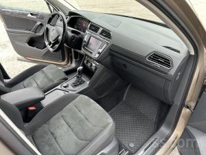 Brown Volkswagen Tiguan 2016 in Valmiera, with an engine capacity of 2.00 L and mileage of 184 thousand km for 14000 €, photo 13 on AUTOMOTO.COM.LV