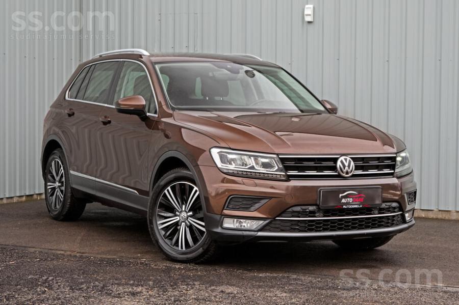 Brown Volkswagen Tiguan 2016 in Ogre, with an engine capacity of 2.00 L and mileage of 126 thousand km for 17700 €, photo 1 on AUTOMOTO.COM.LV