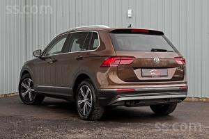 Brown Volkswagen Tiguan 2016 in Ogre, with an engine capacity of 2.00 L and mileage of 126 thousand km for 17700 €, photo 4 on AUTOMOTO.COM.LV