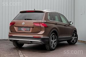 Brown Volkswagen Tiguan 2016 in Ogre, with an engine capacity of 2.00 L and mileage of 126 thousand km for 17700 €, photo 5 on AUTOMOTO.COM.LV
