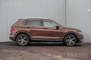 Brown Volkswagen Tiguan 2016 in Ogre, with an engine capacity of 2.00 L and mileage of 126 thousand km for 17700 €, photo 6 on AUTOMOTO.COM.LV