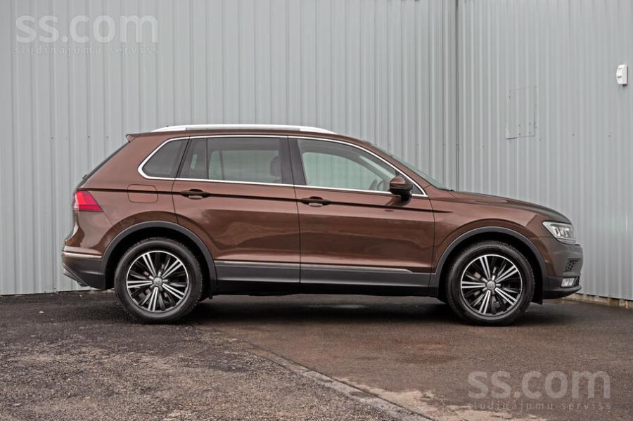 Brown Volkswagen Tiguan 2016 in Ogre, with an engine capacity of 2.00 L and mileage of 126 thousand km for 17700 €, photo 6 on AUTOMOTO.COM.LV