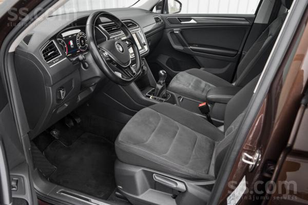 Brown Volkswagen Tiguan 2016 in Ogre, with an engine capacity of 2.00 L and mileage of 126 thousand km for 17700 €, photo 7 on AUTOMOTO.COM.LV