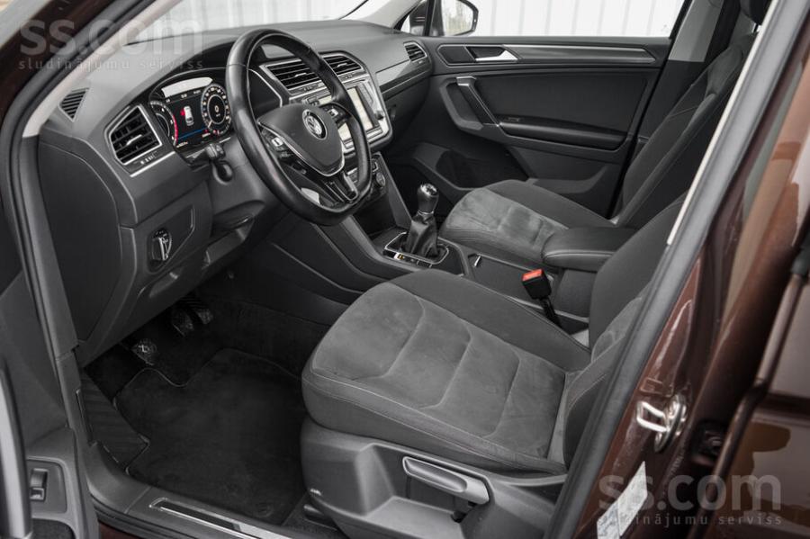 Brown Volkswagen Tiguan 2016 in Ogre, with an engine capacity of 2.00 L and mileage of 126 thousand km for 17700 €, photo 8 on AUTOMOTO.COM.LV