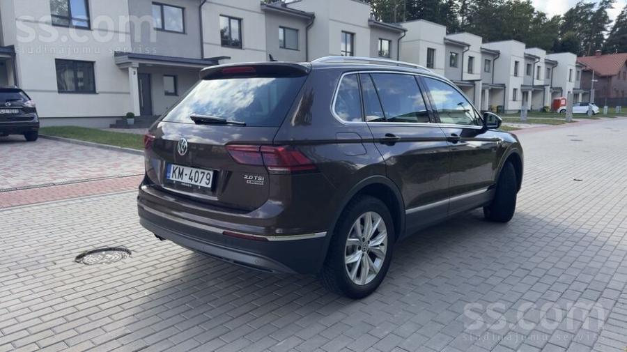 Brown Volkswagen Tiguan 2016 in Riga, with an engine capacity of 2.00 L and mileage of 136 thousand km for 17000 €, photo 5 on AUTOMOTO.COM.LV