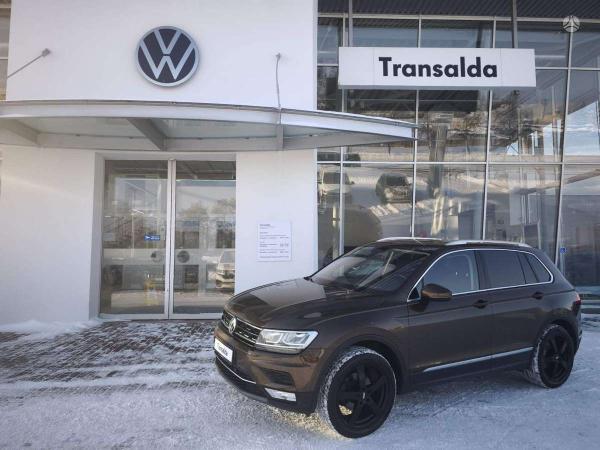 Brown Volkswagen Tiguan 2017 in Siauliai, with an engine capacity of 1.40 L and mileage of 147 thousand km for 18900 €, photo 1 on AUTOMOTO.COM.LV