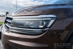Brown Volkswagen Tiguan 2017 in Riga, with an engine capacity of 2.00 L and mileage of 197 thousand km for 15950 €, photo 17 on AUTOMOTO.COM.LV