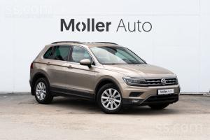 Brown Volkswagen Tiguan 2018 in Riga, with an engine capacity of 1.40 L and mileage of 185 thousand km for 19000 €, photo 2 on AUTOMOTO.COM.LV