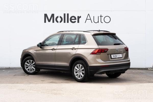 Brown Volkswagen Tiguan 2018 in Riga, with an engine capacity of 1.40 L and mileage of 185 thousand km for 15950 €, photo 3 on AUTOMOTO.COM.LV