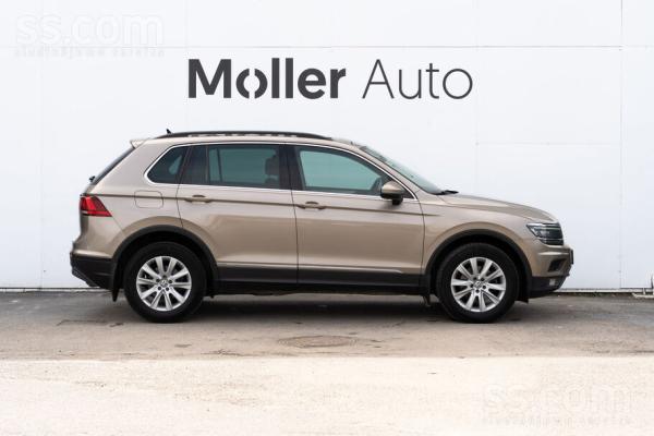 Brown Volkswagen Tiguan 2018 in Riga, with an engine capacity of 1.40 L and mileage of 185 thousand km for 15950 €, photo 5 on AUTOMOTO.COM.LV
