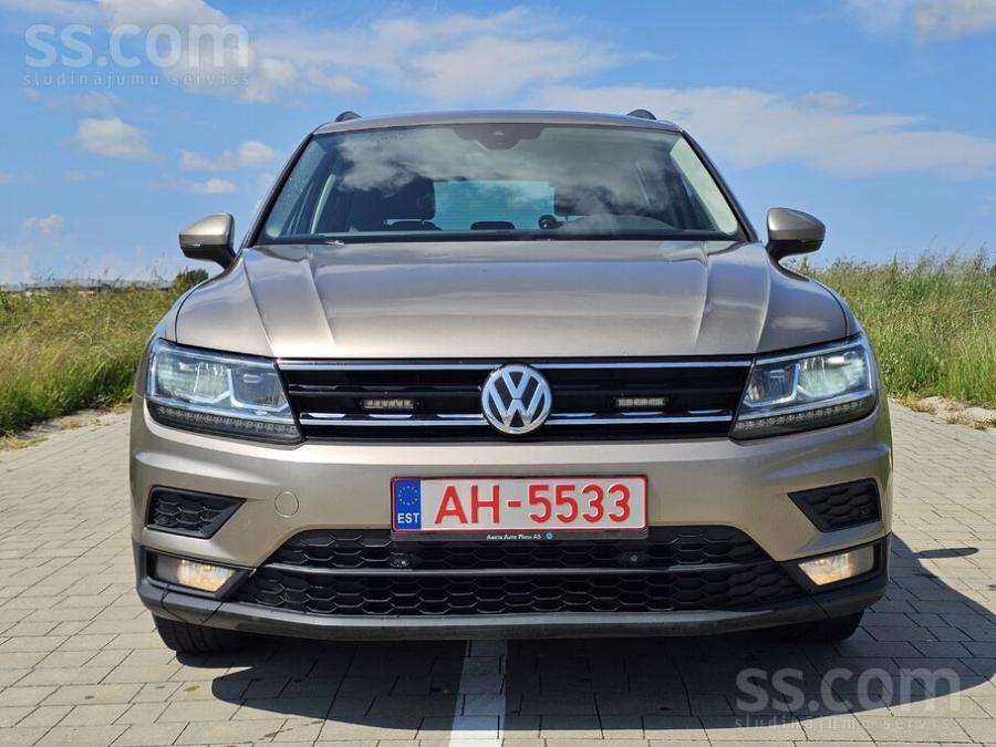 Brown Volkswagen Tiguan 2018 in Riga, with an engine capacity of 1.40 L and mileage of 321 thousand km for 11800 €, photo 4 on AUTOMOTO.COM.LV