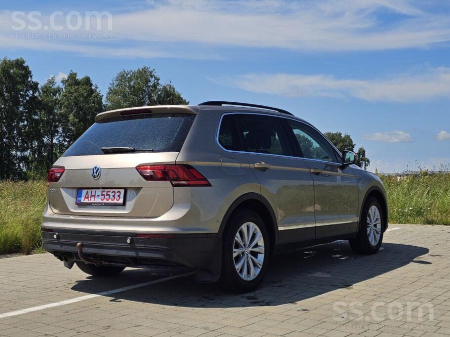 Brown Volkswagen Tiguan 2018 in Riga, with an engine capacity of 1.40 L and mileage of 321 thousand km for 11800 €, photo 8 on AUTOMOTO.COM.LV