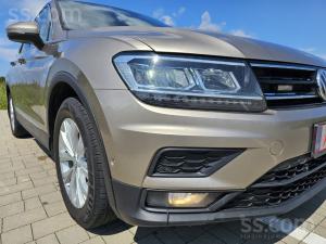 Brown Volkswagen Tiguan 2018 in Riga, with an engine capacity of 1.40 L and mileage of 321 thousand km for 11800 €, photo 11 on AUTOMOTO.COM.LV