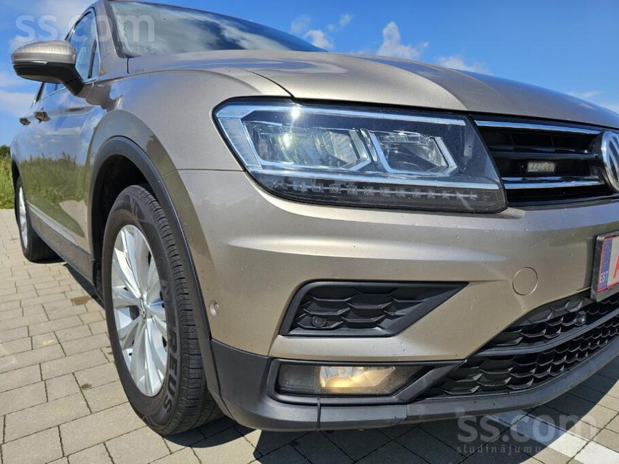Brown Volkswagen Tiguan 2018 in Riga, with an engine capacity of 1.40 L and mileage of 321 thousand km for 11800 €, photo 11 on AUTOMOTO.COM.LV