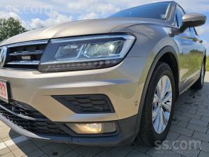 Brown Volkswagen Tiguan 2018 in Riga, with an engine capacity of 1.40 L and mileage of 321 thousand km for 11800 €, photo 12 on AUTOMOTO.COM.LV
