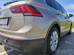 Brown Volkswagen Tiguan 2018 in Riga, with an engine capacity of 1.40 L and mileage of 321 thousand km for 11800 €, photo 14 on AUTOMOTO.COM.LV