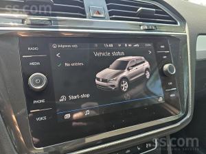 Brown Volkswagen Tiguan 2018 in Riga, with an engine capacity of 1.40 L and mileage of 321 thousand km for 11800 €, photo 25 on AUTOMOTO.COM.LV