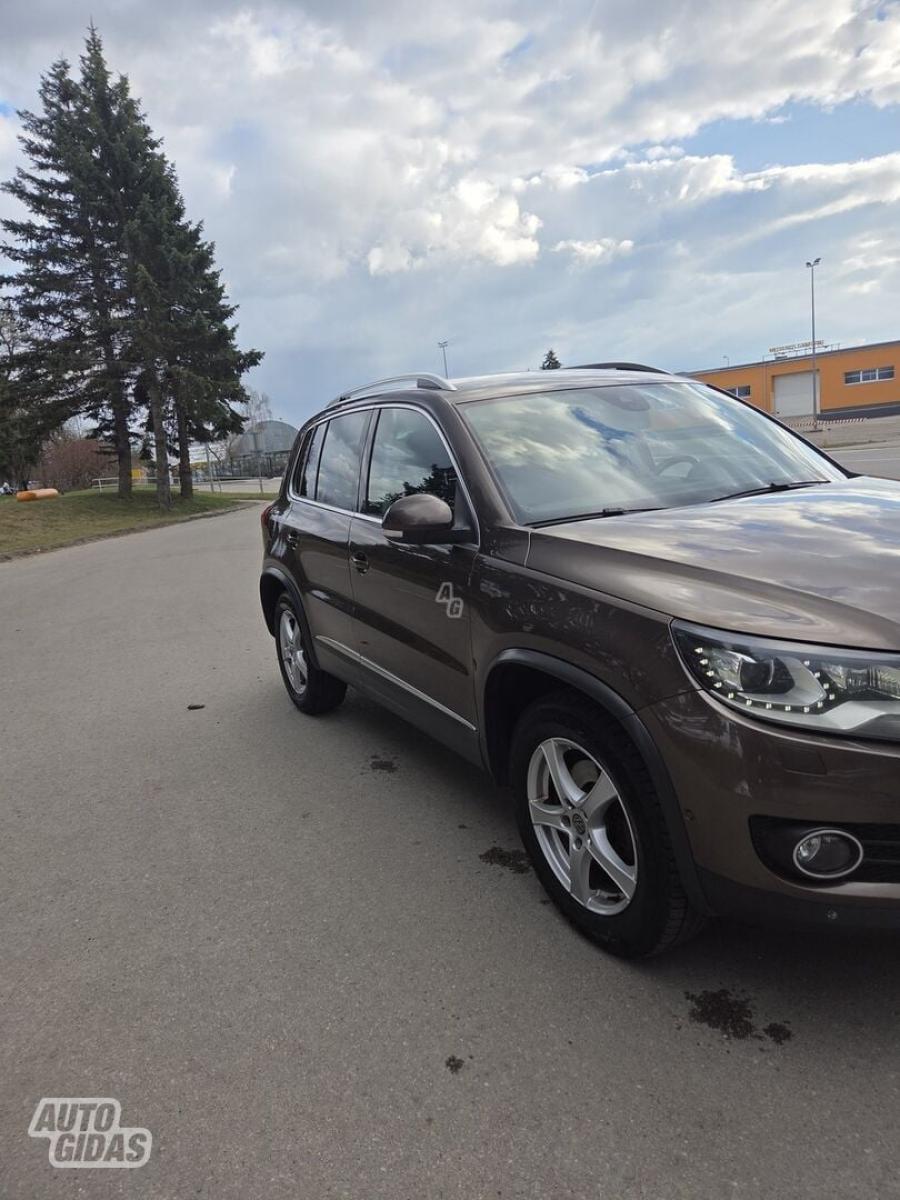 Brūns Volkswagen Tiguan 2012 Alīta, ar dzinēja tilpumu 2.00 L un nobraukumu 374 tūkst. km par 6500 €, foto 5 vietnē AUTOMOTO.COM.LV
