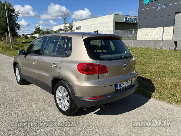Brown Volkswagen Tiguan 2011 in Tallinn, with an engine capacity of 2.00 L and mileage of 264 thousand km for 6950 €, photo 5 on AUTOMOTO.COM.LV