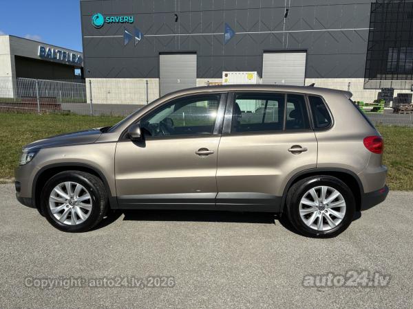 Brown Volkswagen Tiguan 2011 in Tallinn, with an engine capacity of 2.00 L and mileage of 264 thousand km for 6950 €, photo 6 on AUTOMOTO.COM.LV
