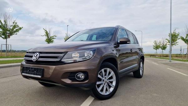 Brown Volkswagen Tiguan 2013 in Marijampole, with an engine capacity of 1.97 L and mileage of 300 thousand km for 7990 €, photo 6 on AUTOMOTO.COM.LV
