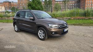 Brown Volkswagen Tiguan 2013 in Narva, with an engine capacity of 2.00 L and mileage of 110 thousand km for 10900 €, photo  on AUTOMOTO.COM.LV