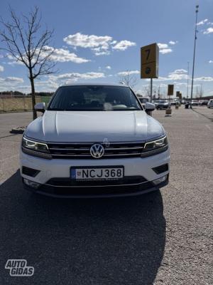 Volkswagen Tiguan 2016 in Vilnius, with an engine capacity of 2.00 L and mileage of 230 thousand km for 14000 €, photo 3 on AUTOMOTO.COM.LV