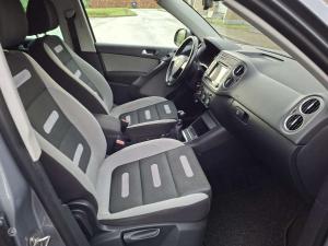 Green Volkswagen Tiguan 2008 in Ukmerge, with an engine capacity of 1.40 L and mileage of 241 thousand km for 4500 €, photo 13 on AUTOMOTO.COM.LV