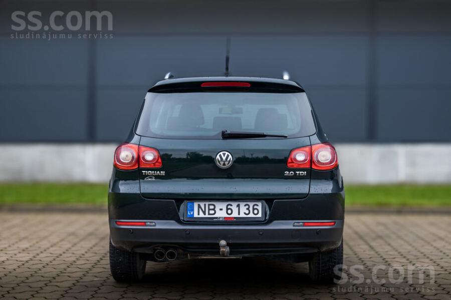 Green Volkswagen Tiguan 2010 in Riga, with an engine capacity of 2.00 L and mileage of 315 thousand km for 6990 €, photo 11 on AUTOMOTO.COM.LV
