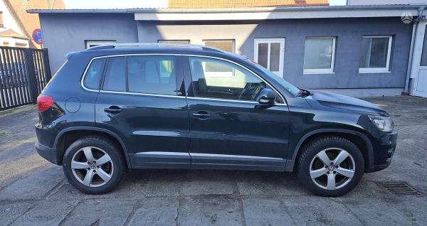 Green Volkswagen Tiguan 2012 in Kelme, with an engine capacity of 1.97 L and mileage of 236 thousand km for 6990 €, photo 8 on AUTOMOTO.COM.LV