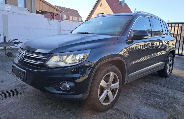 Green Volkswagen Tiguan 2012 in Kelme, with an engine capacity of 1.97 L and mileage of 236 thousand km for 6990 €, photo 9 on AUTOMOTO.COM.LV