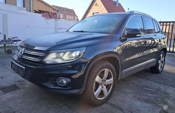 Green Volkswagen Tiguan 2012 in Kelme, with an engine capacity of 1.97 L and mileage of 236 thousand km for 6900 €, photo 1 on AUTOMOTO.COM.LV